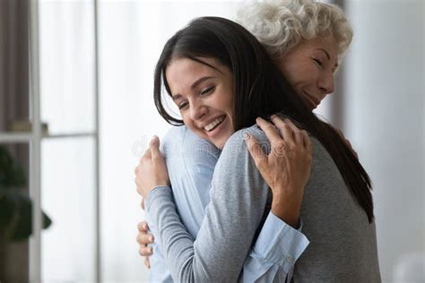 Elderly Grandmother Her Adult Daughter And Granddaughter Having Fun