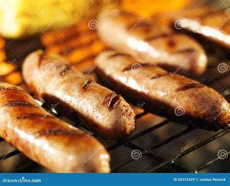 Bratwursts On Grill With Corn Stock Image Image Of Orange Close