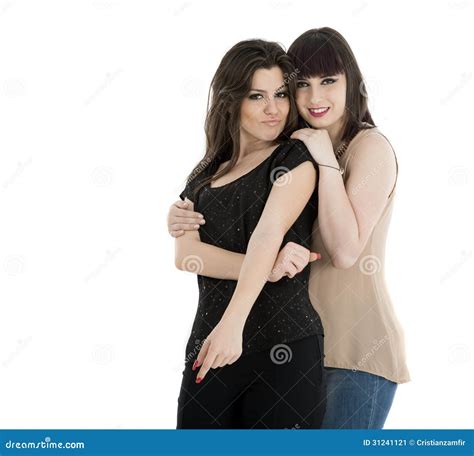 Dos Mujeres Sensuales Jovenes Hermosas Del Encanto Que Se Unen Encima