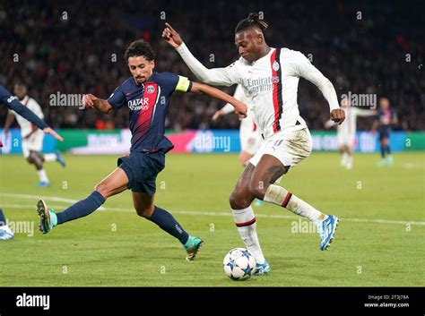 Ac Milans Rafael Leao In Action Against Psgs Marquinhos During The