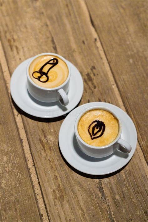 Two Cups Of Coffee With A Pattern Symbolizing Honeymoon And Marriage