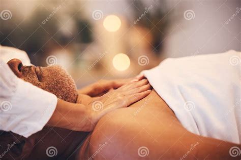 Massage Spa And Therapist Hands With Man Client In Luxury Zen Or Calm