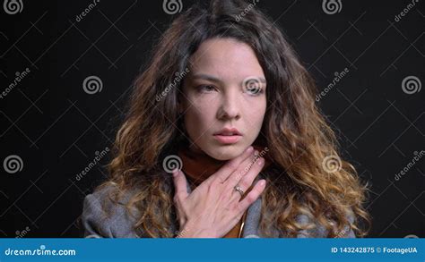 Closeup Shoot Of Young Attractive Caucasian Female With Brunette Curly