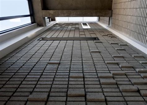 Sinjinmal Building By Studio Gaon Occupies Its Site Like A Book In An