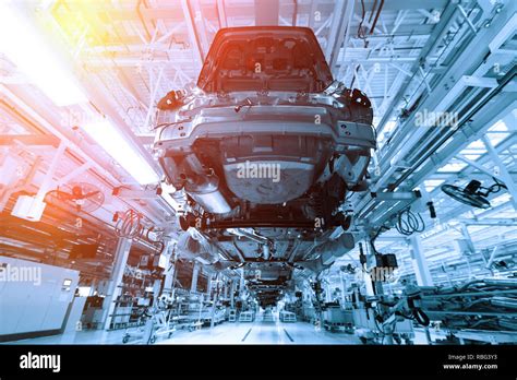 Assembling Parts Of The Car Robots Automated Build Process Of Cars