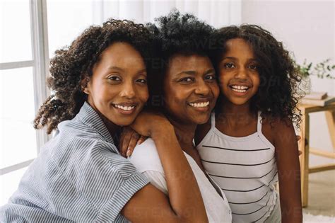 Woman With Her Two Beautiful Daughters Portrait Of Beautiful Mother