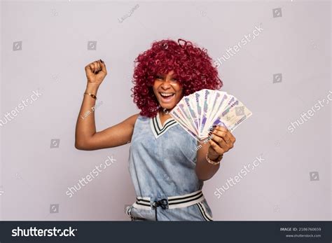 Excited Happy African Lady Flaunting Some Stock Photo 2186760659