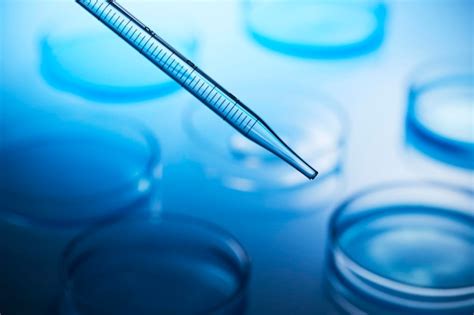 Premium Photo Science Laboratory With Beaker And Dropper