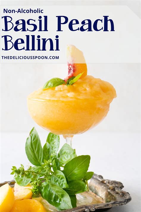 A Frozen Peach Bellini Mocktail Made With Frozen Peach Purée Basil