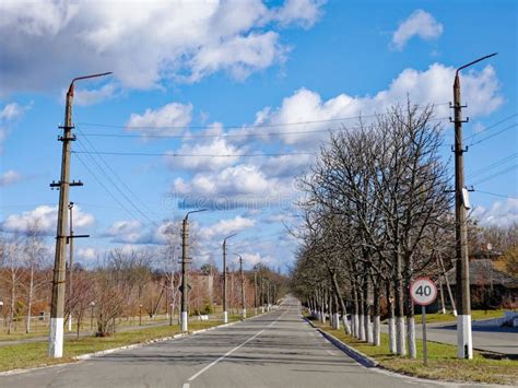 A Rural Road With A Speed Limit Sign Stock Image Image Of Trees Sign