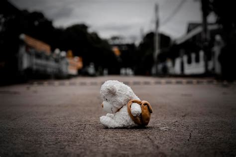 Premium Photo Lonely Teddy Bear Sleep On Cement Floor For Created