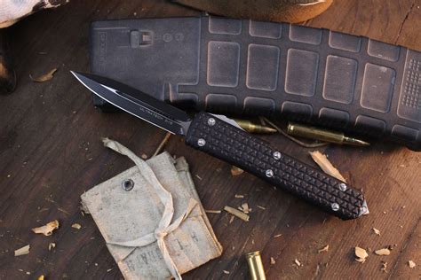 Microtech Ultratech D E Otf Auto Black Tri Grip Aluminum Black Elmax Pre Owned
