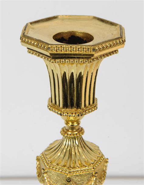 A Pair Of English Regency Gilt Bronze Candlesticks Circa 1800 For Sale