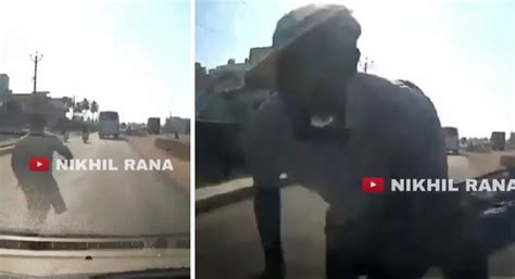Scammer Jumps On To Moving Car Dashcam Captures His Act