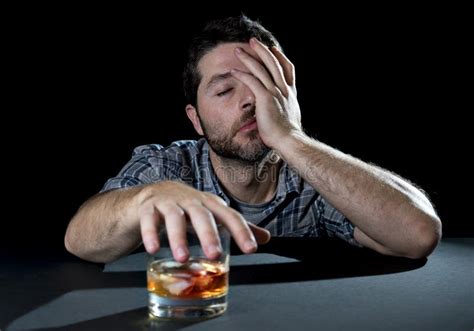 Alcoholic Addict Man Drunk With Whiskey Glass In Alcoholism Concept