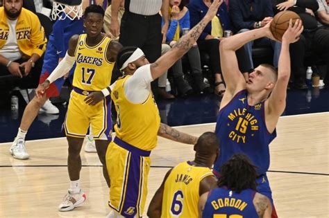 Jokic Dominates As Nuggets Hold Off Lakers In Opener Abs Cbn News