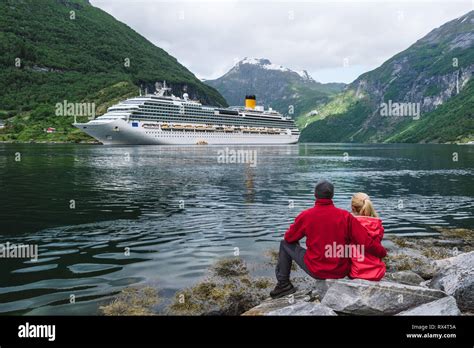 Geirangerfjord Cruise A Fairytale By The Fjord Couple Enjoys A