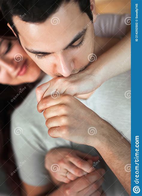 Close Up Of Kiss A Woman`s Hand The Man Kisses His Wife Hand The