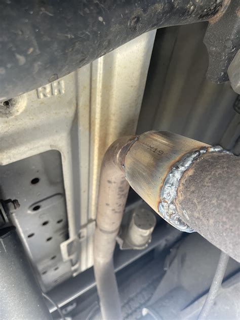 Got my tailpipe welded back on for $60 at a fairly sketchy muffler shop. I am not complaining ...