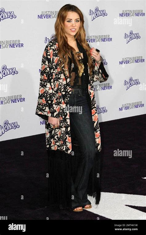 Mylie Cyrus At The Premiere Of Justin Bieber Never Say Never At