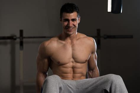 Premium Photo Resting Time Confident Muscled Young Man Resting In