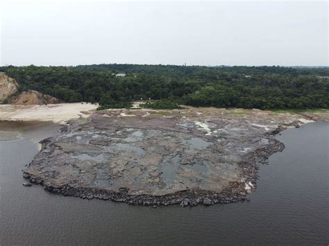 Ancient Face Carvings Exposed As Amazon Water Level Drops To Record