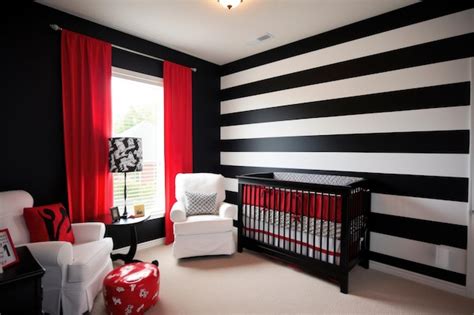 Premium AI Image A Dramatic Black And White Striped Wall With A Single Red Accent Created With