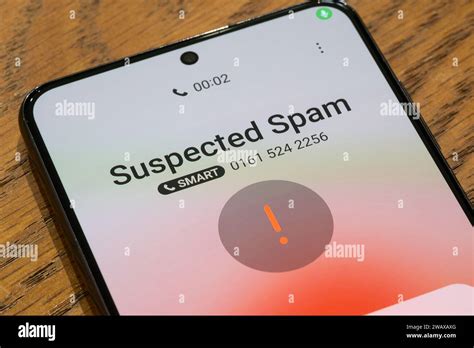 A Smartphone Screen Showing An Incoming Suspected Spam Call Uk Theme
