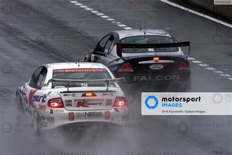 Greg Murphy And Craig Lowndes Battle For Position On The Main Straight