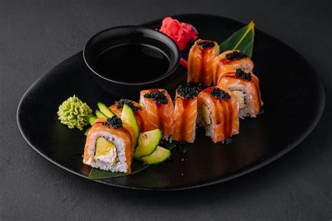 Premium Photo Philadelphia Sushi With Avocado On Black Plate