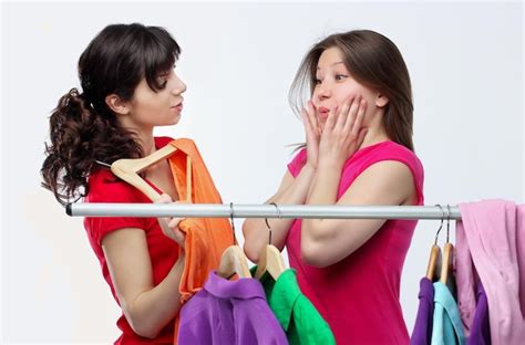 Premium Photo Happy Friends Two Girls In A Fitting Room Of A Clothing Store
