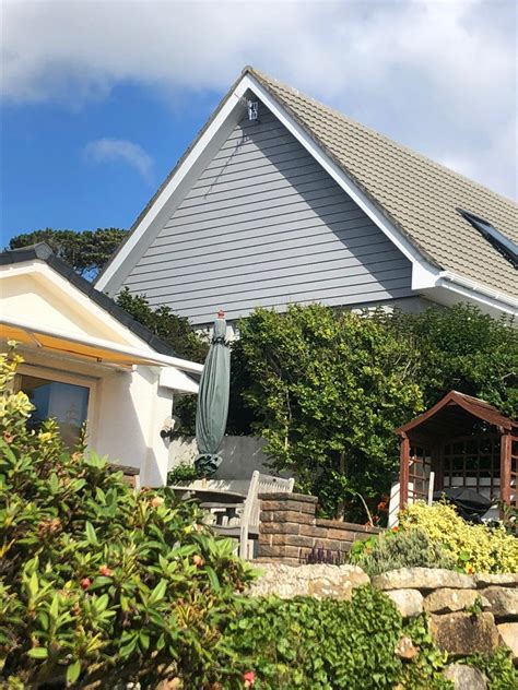 C05 Grey Cedral Lap Woodgrain Cladding Cornwall Elite Cladding