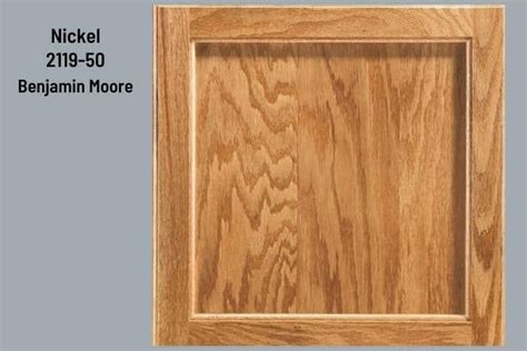 An Oak Cabinet Door With The Name Oyster Bay Sw 6300 Shewin Williams On It