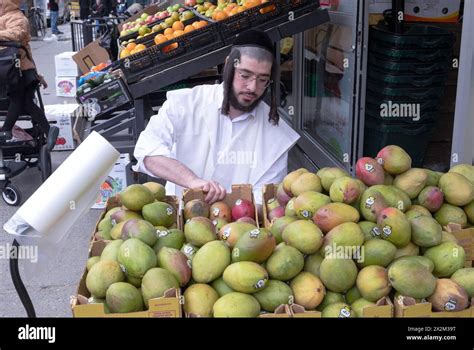 On The Day Before Passover A Hasidic Worker In A Supermarket Sets Out