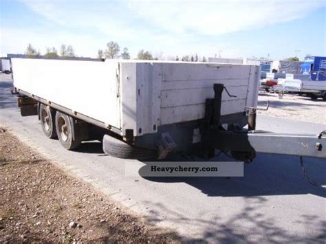 TPS 100 TANDEM 2000 Stake body Trailer Photo and Specs