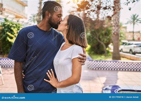Man And Woman Couple Kissing And Hugging Each Other At Street Stock