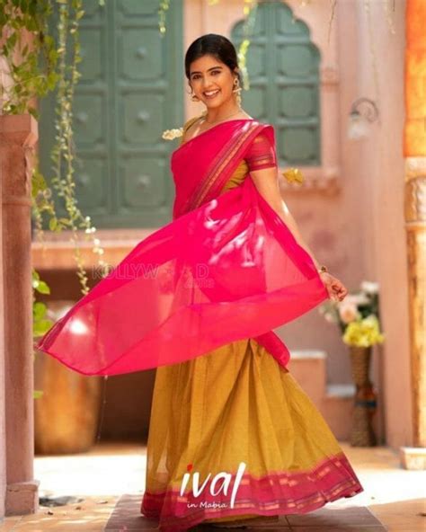 Cute And Gorgeous Amritha Aiyer In Red Half Saree Photoshoot Stills 09