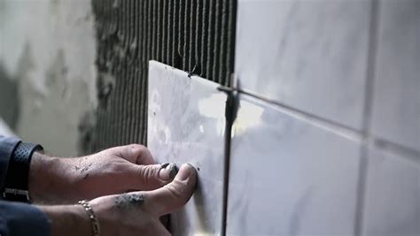 Putting Ceramic Tile On The Stock Footage Video 100 Royalty Free