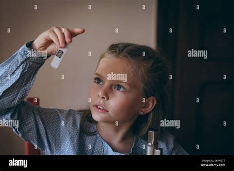 Girl Experimenting Microscope Slide Microscope Stock Photo Alamy