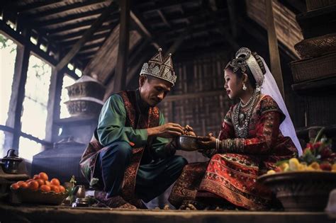 A Husband And Wife Get Married In The Minang Wedding Tradition