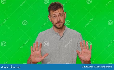 Man Warning With Admonishing Finger Gesture Saying No Be Careful