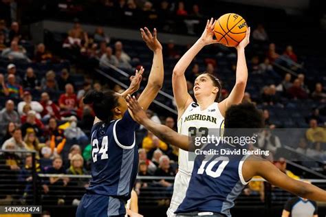 Emily Kiser Of The Michigan Wolverines Goes Up For A Shot While Alexa