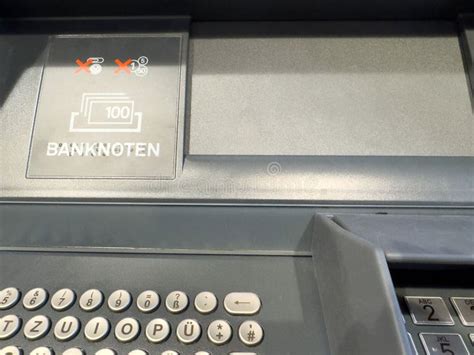 German Atm Interface Displaying Instructional Icons And Keypad Details