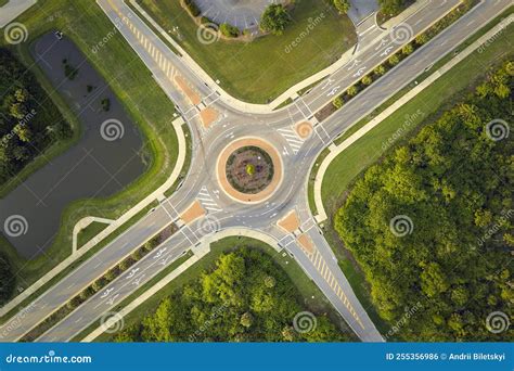 Aerial View Of Road Roundabout Intersection With Moving Cars Traffic