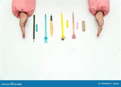 A Gril Displaying Her Different Kinds Of Pens And Pencil Stock Image Image Of Pencils Article