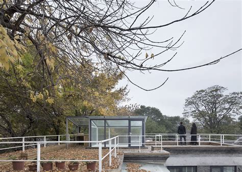 Arch Studio Adds Sculptural White Staircase To Beijing House