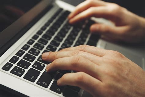 Premium Photo Hacker Using Laptop Closeup