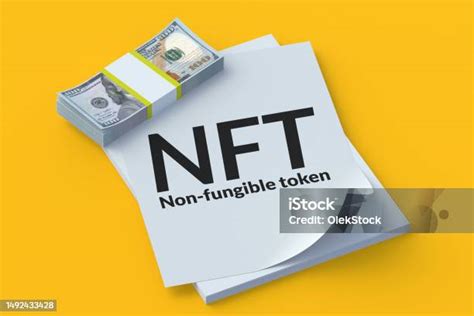 돈 더미 근처의 종이 시트에 Nft 비문 대체 불가능한 토큰입니다 블록체인 기술 개념입니다 디지털 마케팅 현대 미술 암호화