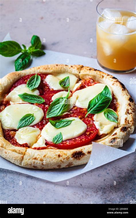 Classic Neopolitan Margherita Pizza With Tomatoes Mozzarella And Basil