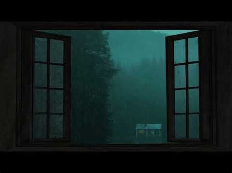 An Open Window In A Dark Room With Trees Outside